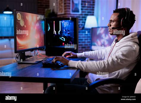 Cheerful Person Live Streaming Shooter Video Games On Computer