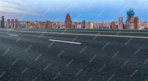 Premium Photo Background Of Asphalt Pavement And Urban Architectural