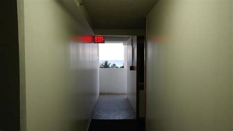 Premium Photo Exit Sign In Passage Of Building