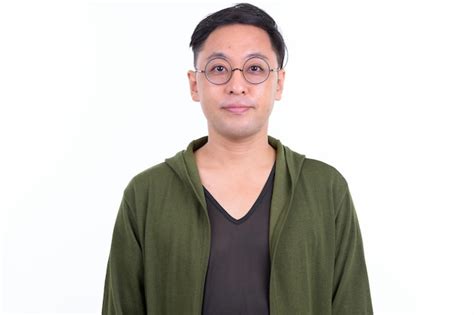 Premium Photo Japanese Man With Eyeglasses Isolated Against White Wall