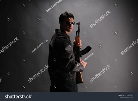 Sexy Man Holds Rifle He Poses Stock Photo 1116222401 Shutterstock