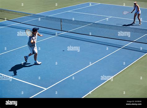 Showing Up To Every Tennis Practice A Man Trying To Return A Ball On A