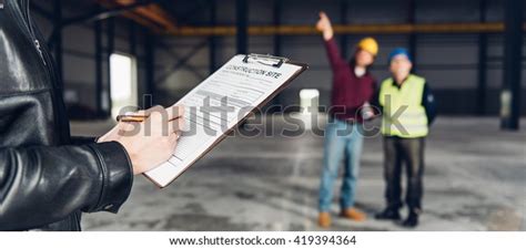 Site Inspector Making Inspection Report Big Stock Photo Shutterstock