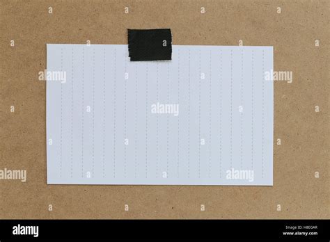 Vintage Of Note Paper On Brown Background And Copy Specs You Can Input