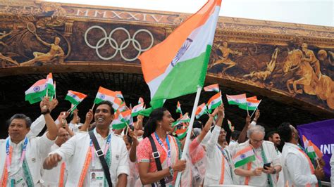 Buoyant Indian Athletes Wave Flags On River Seine In Paris Olympics