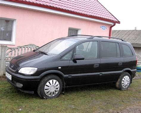 Купил новые колпаки на зиму — Opel Zafira A, 2 л, 2002 года ...