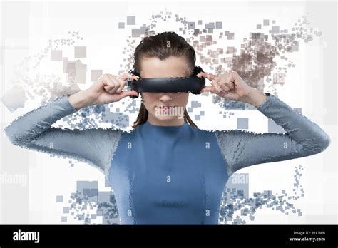 Digital Composite Of Woman With An Augmented Reality Simulator Stock