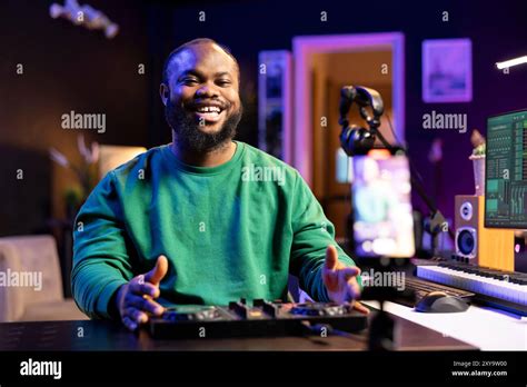 Audio Engineer Filming A Tutorial To Teach The Basic Controls On A