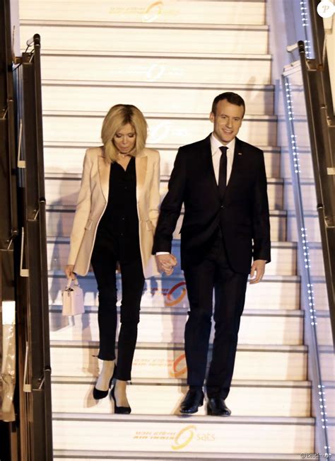 Le président Emmanuel Macron La première dame Brigitte Macron lors de