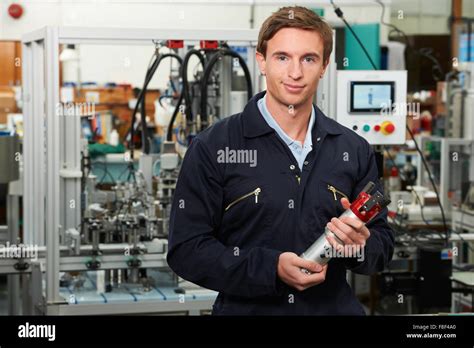Engineer Checking Component In Factory Stock Photo Alamy