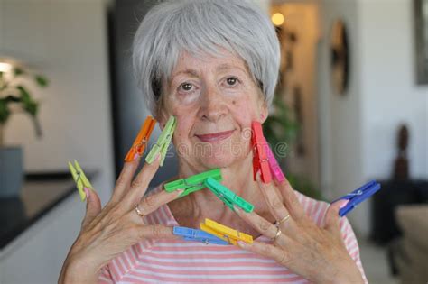 Senior Woman Pretending To Have Long Nails Stock Image Image Of Hold