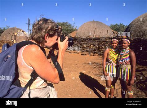 Tourist Shooting Coloful Women In Native Zulu Tribe At Shakaland Stock