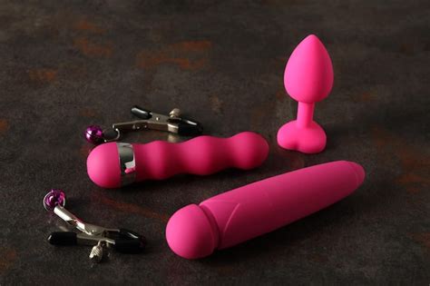 Premium Photo Sex Toys Of Pink Color On A Dark Background