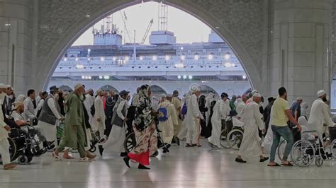 Muslim Pilgrims Performing Circumambulation Of Kaaba Tawaf On The