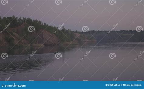 Morning Landscape A Man In A Kayak Floats On A Calm River Stock Video