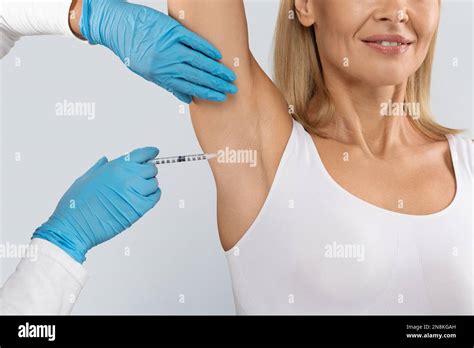 The Doctor Makes Intramuscular Injections In The Underarm Area Stock Photo Alamy