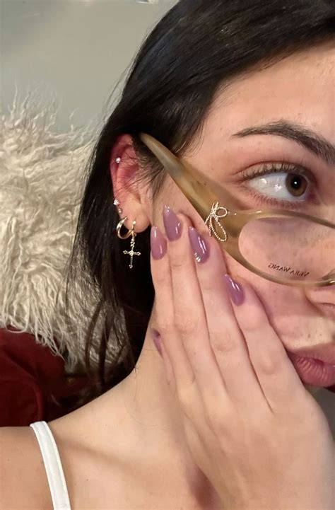 Earring Stack Inspo In 2025 Cross Earrings Outfit Earrings Outfit