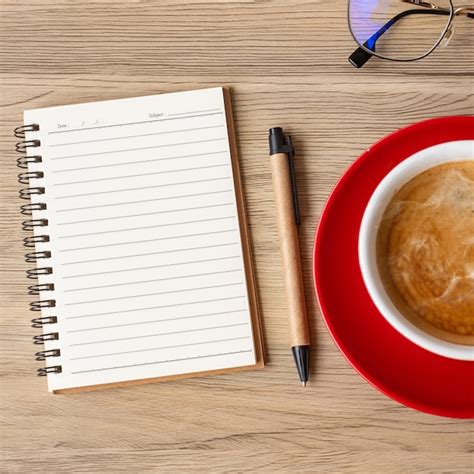 Premium Photo Blank Notebook And Coffee Cup On Wood Table Motivation Resolution To Do List
