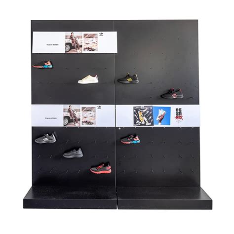 perimeter shelving for unique shoe store pop displays manufacturer