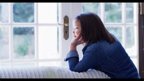 Video Of Thoughtful Asian Girl Looking Outside Window Video From Pikwizard