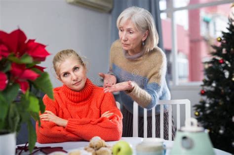 Elderly Mother And Adult Daughter Scandal In Domestic Interior Stock
