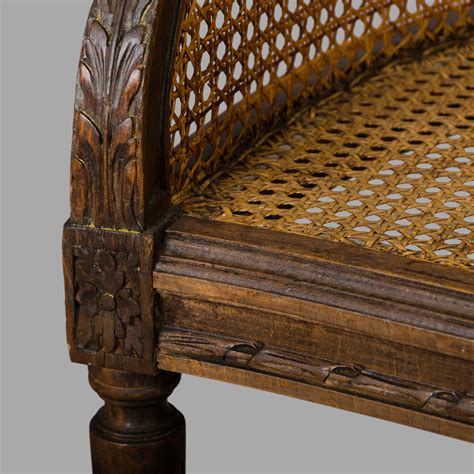 Paire de fauteuils cabriolets cannés de style Louis XVI Paul Bert Serpette