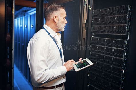 It Support Are The Unsung Heroes A Mature Man Using A Digital Tablet