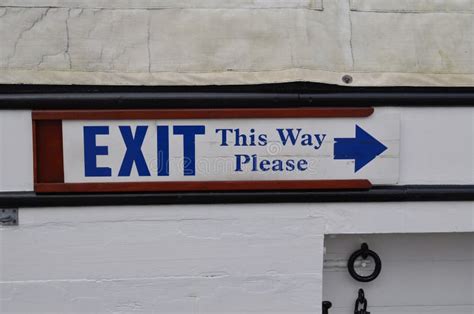 Exit This Way Please Sign Stock Image Image Of Arrow 49651793