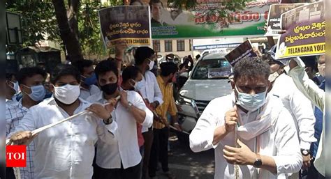 Telangana Youth Congress Members Pull Vehicles With Ropes Protesting