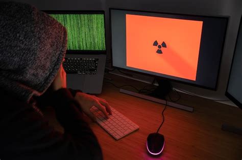 Premium Photo An Anonymous Male Hacker Use His Skills To Hack Systems
