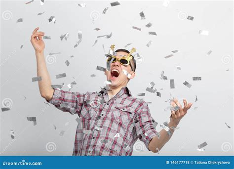 People Holidays And Party Concept Funny Guy In Glasses Dancing In