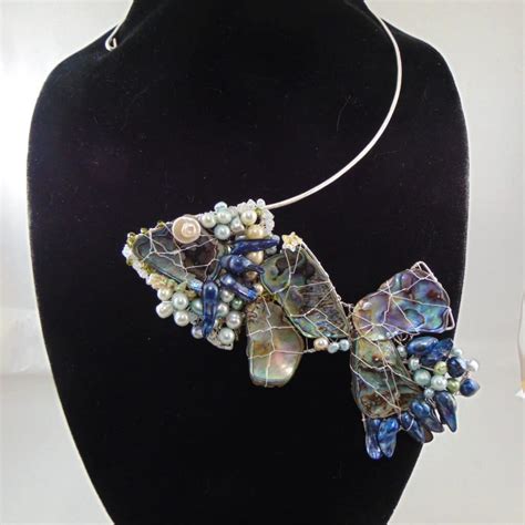 Wrap Around Design Fish Of Paua Shell Cultured Freshwater Pearls On