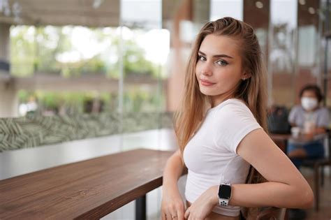 Premium Photo Portrait Of Blonde Girl With Fluttering Hair