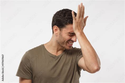 Disappointed Stressed Out Guy Making Facepalm Gesture With Hand Face