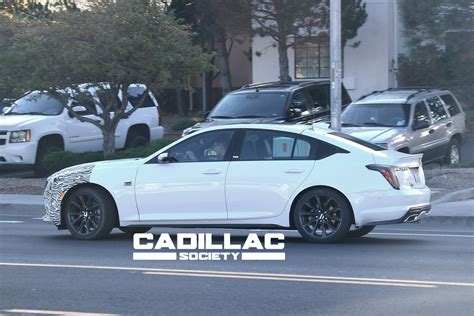Refreshed 2024 Cadillac Ct5 Prototype Spotted In Light Camo