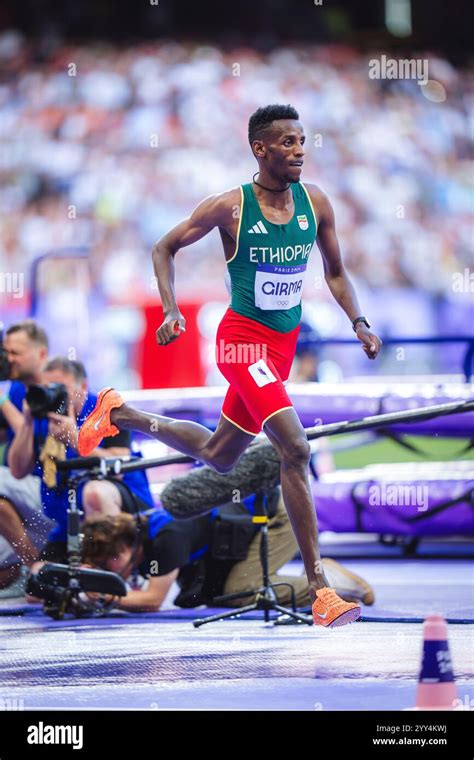 Lamecha Girma Participating In The 3000 Metres Steeplechase At The