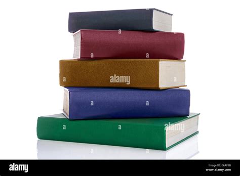 A Stack Of Five Hardback Reference Books With Blank Spines Isolated On