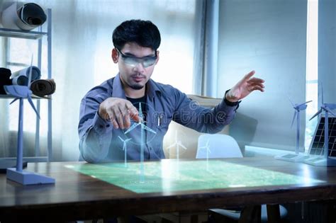 Energy Engineer Wearing Ar Headset Or Hologram Glasses Future Prototype Design Of Wind Turbine
