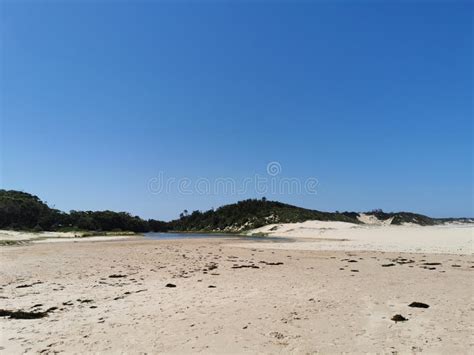 Berrara Beach Runs Between Two Rock Reefs Near The Small Villages Of