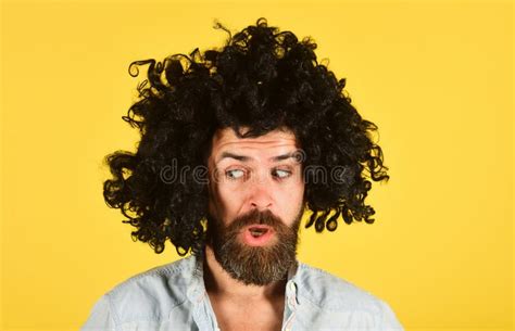 Portrait Of Surprised Bearded Man In Black Wig Party Time Stock Image