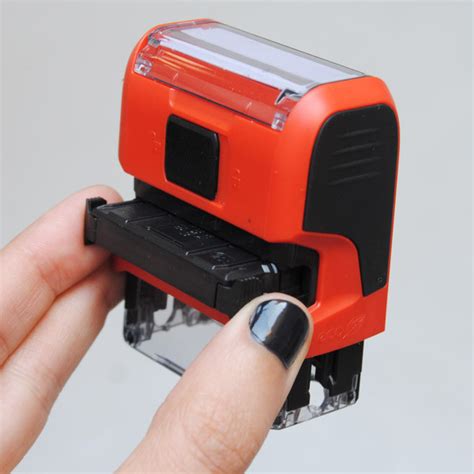 Sello automático para marcar ropa Átomo