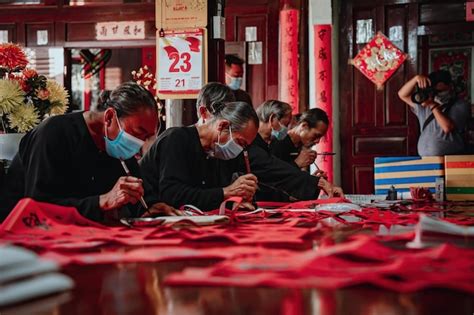 Premium Photo Vietnamese Scholar Writes Calligraphy At Long Son