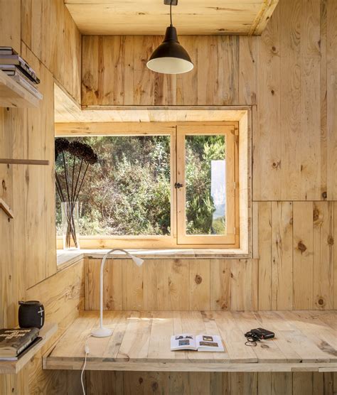 the voxel is a quarantine cabin made from locally sourced materials