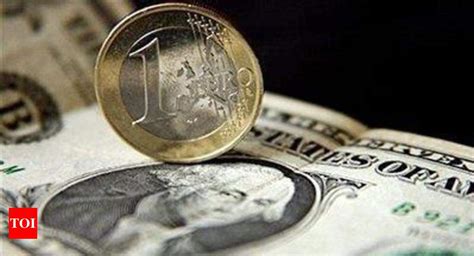 Us Dollar Ends Cheaper Against Rupee Times Of India