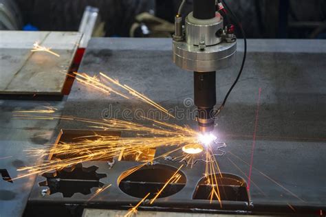 The Laser Cutting Machine Cutting The Sheet Metal Plate With The