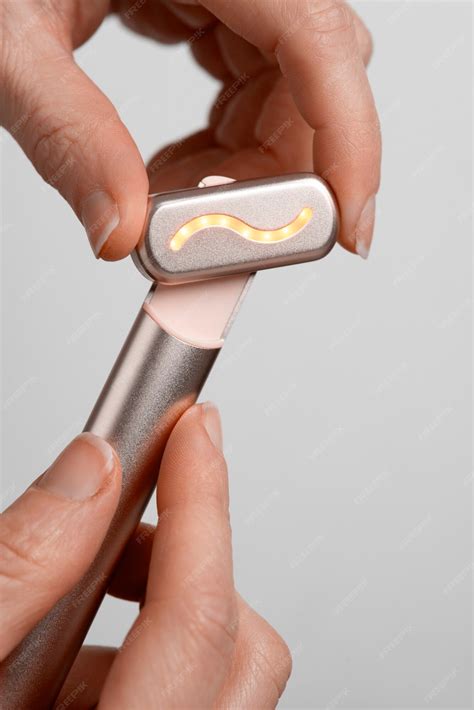 Premium Photo Red Light Therapy Wand For Cosmetic And Skincare Treatment