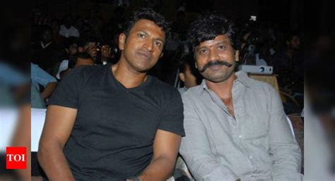Puneeth Rajkumar And Prem Bond At The Title Launch Of Bum Bum Bholenath