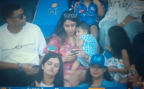 Adorable Moment Rohit Sharmas Wife Ritika And Son Ahaan Cheer For Mi
