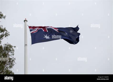 The Australian Flag Hoist On A Large Flag Pole In A Reserve A Large