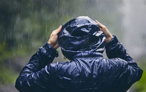Man Walking In Rain